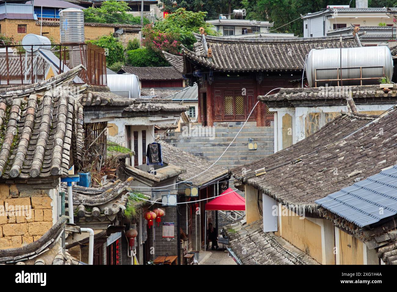 PU'ER, CHINA - JULY 1, 2024 - Tourists visit Bixi Ancient Town in Pu ...