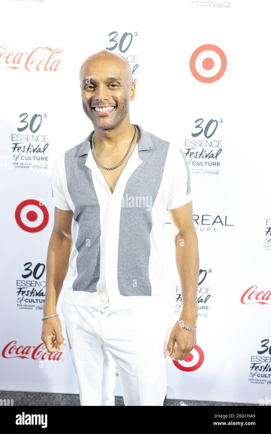 Recording artist Kenny Lattimore in the press room at the 30th ESSENCE ...