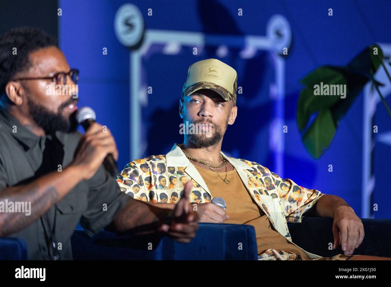 Founder of Black Men Build Phillip Agnew is interviewed by actor Kendrick Sampson at the 30th ...