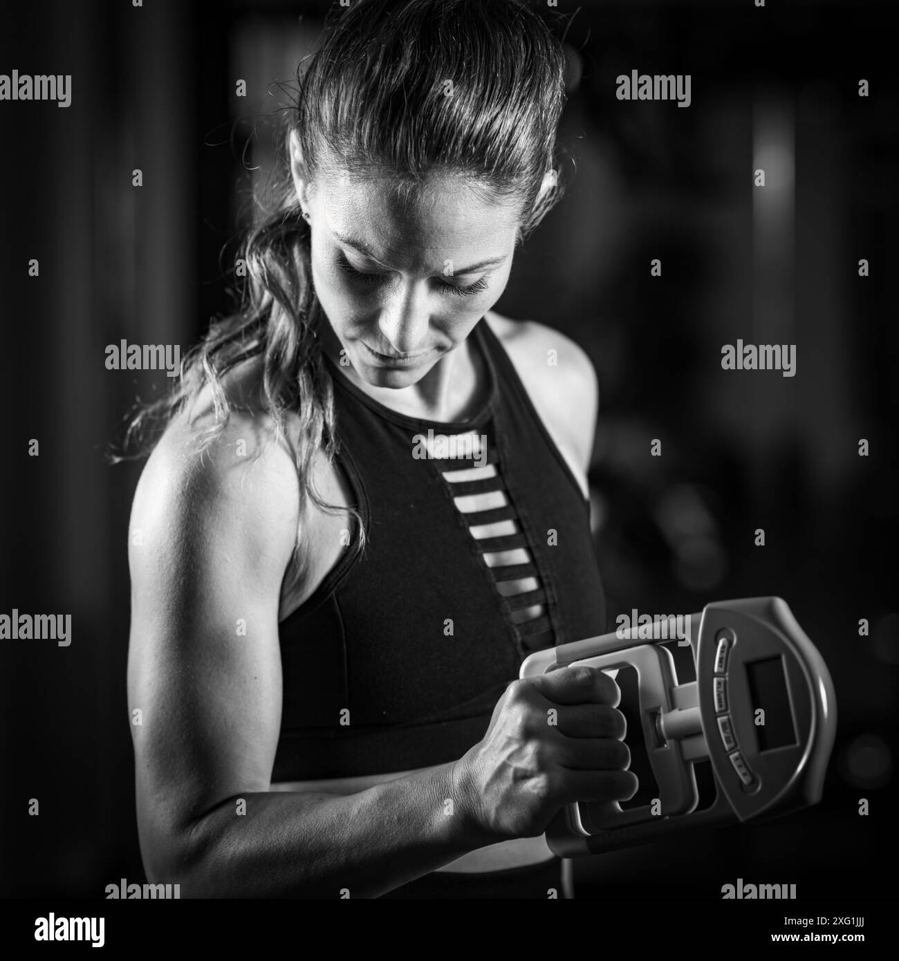 Using hand dynamometer for grip strength test Stock Photo - Alamy