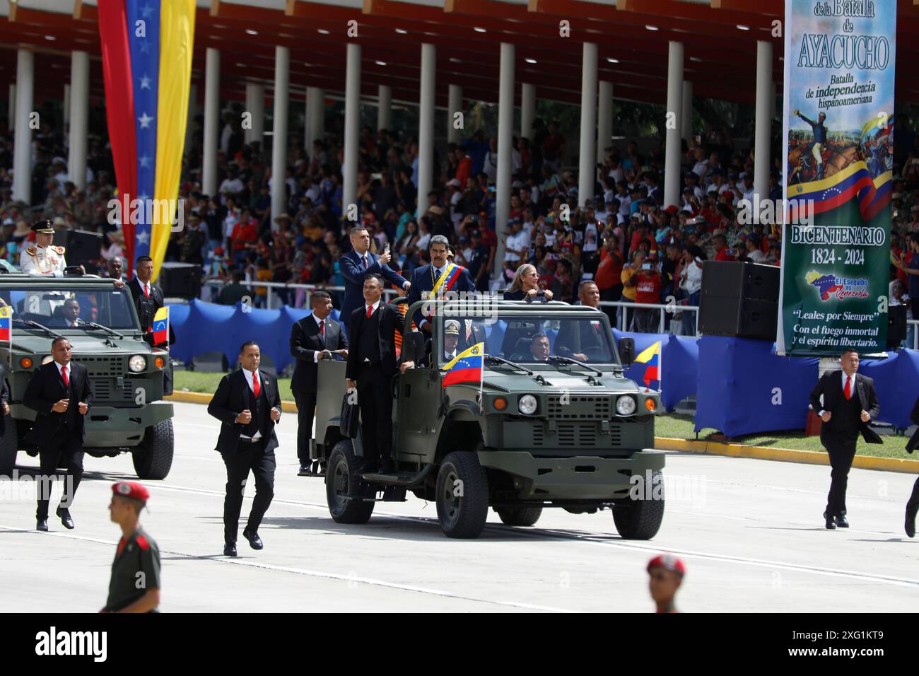 Caracas, Venezuela. 05th July, 2024. President Nicolas Maduro (M) wears ...