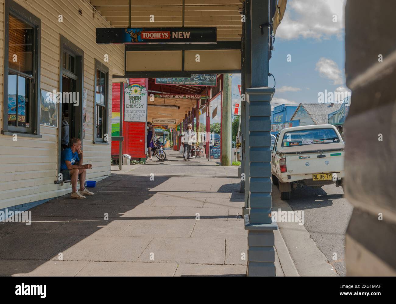 Nimbin Australia - February 5 2012; Under veranda signs in quaint town ...