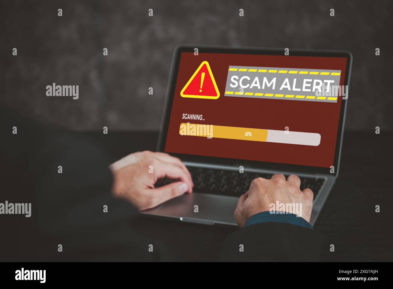 Laptop screen displaying scam alert warning. Highlights cybersecurity ...