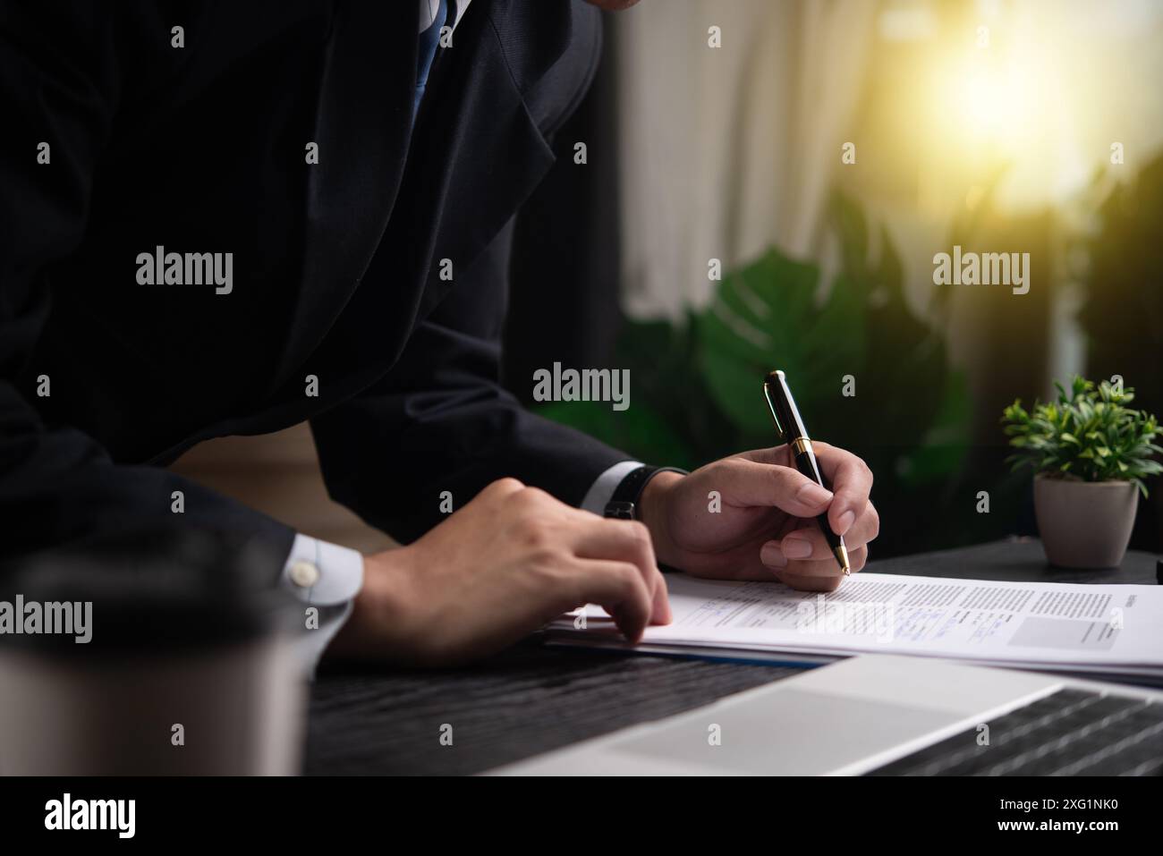 Businessman is holding a certificate hi-res stock photography and ...