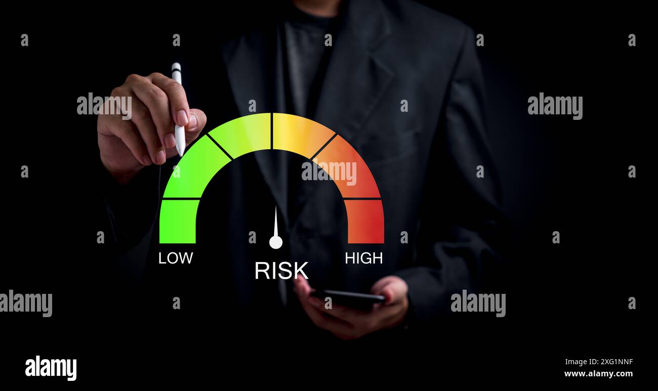 Businessman assessing risk levels with gauge. Visual metaphor for risk ...