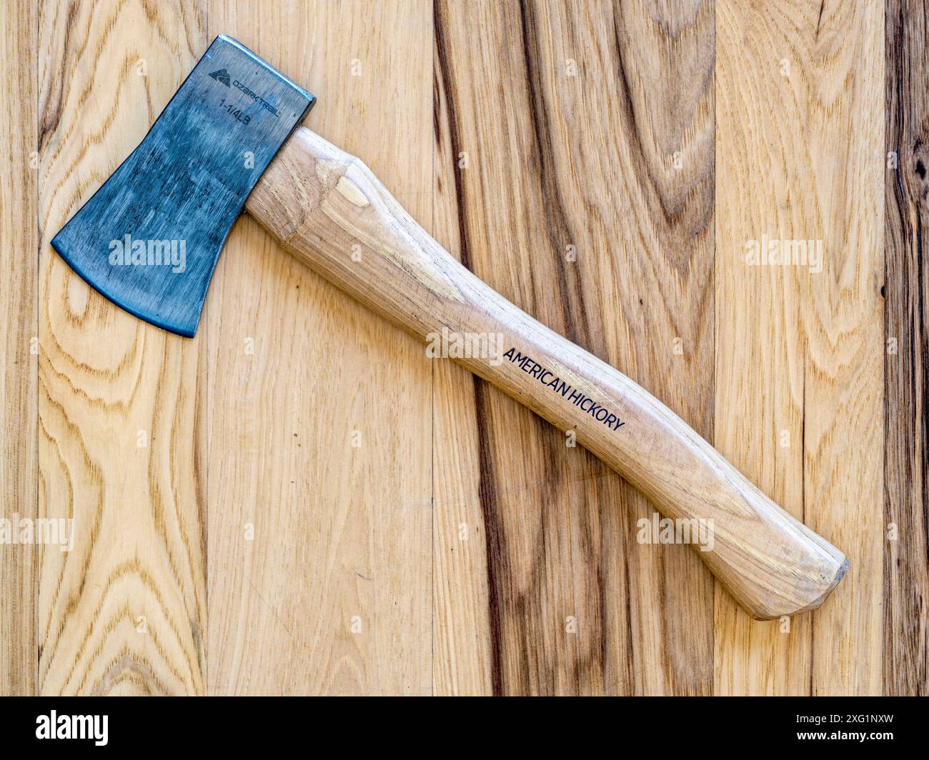 An Ozark Trail 1.25 pound hatchet with an American Hickory handle in ...