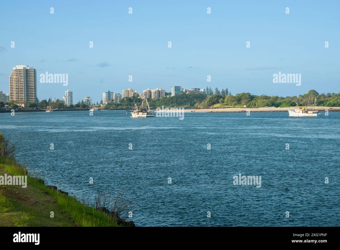 Tweed River and city with prawn boats heading out fishing.1 Stock Photo ...