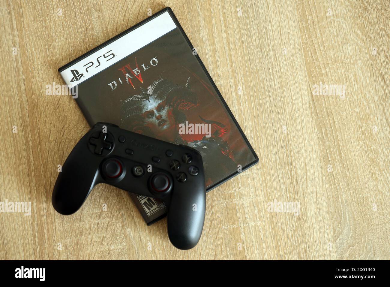 KYIV, UKRAINE - JUNE 26, 2024 Diablo 4 PS5 video game disc box for ...