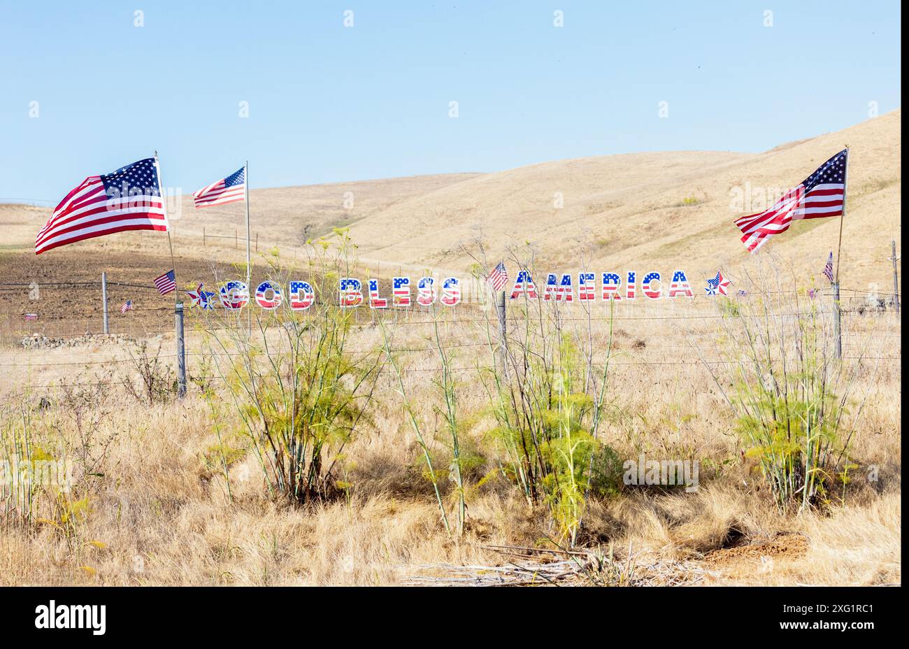American Flags and God Bless America Banner Stock Photo - Alamy