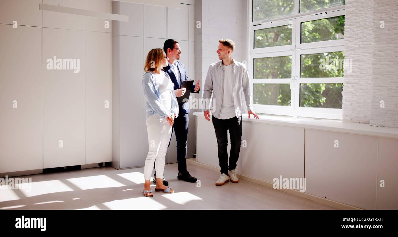 Young Couple Consults Interior Designer To Remodel Luxury Estate While ...