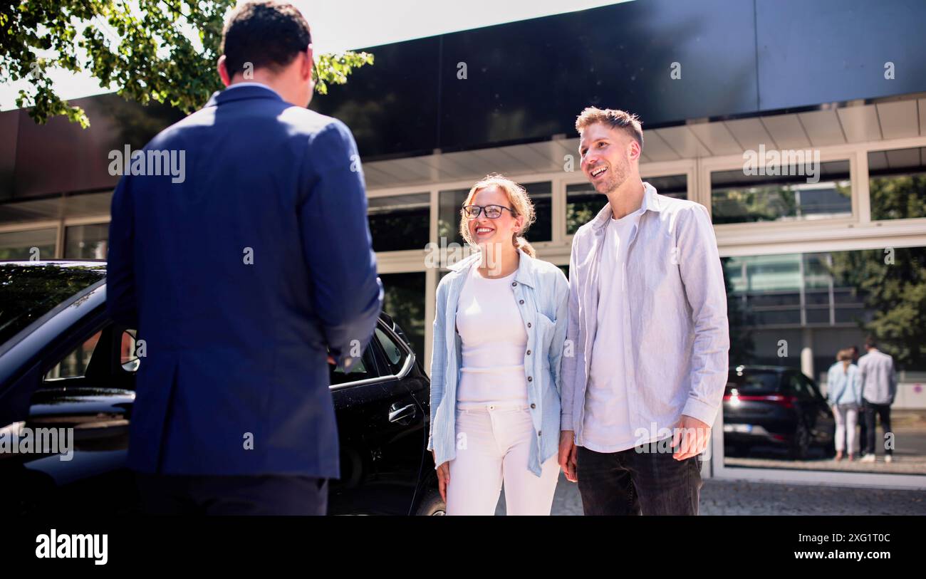 Professional salesman presenting new hi-res stock photography and ...