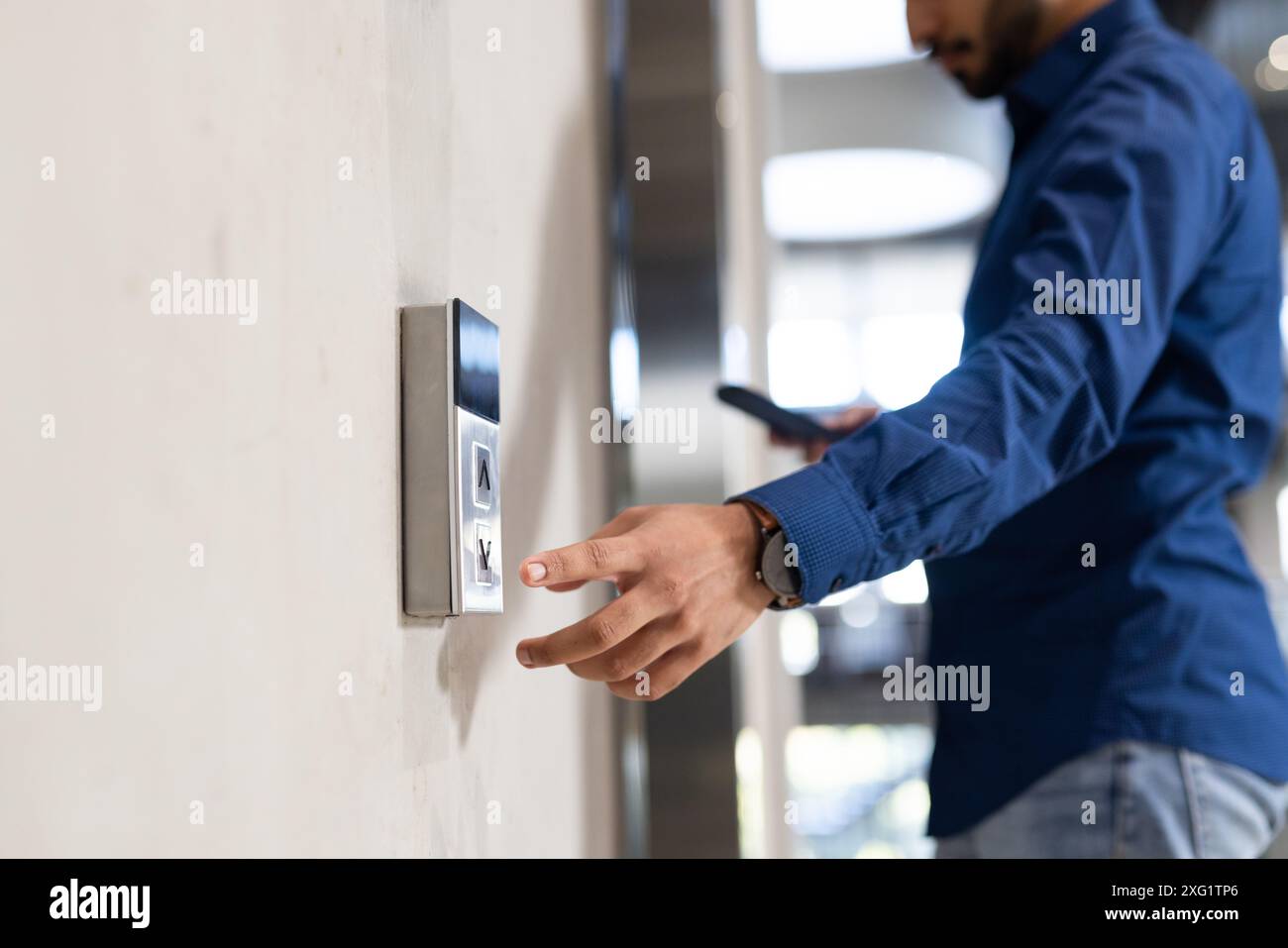 Using keycard, man accessing secure entry system of office building ...