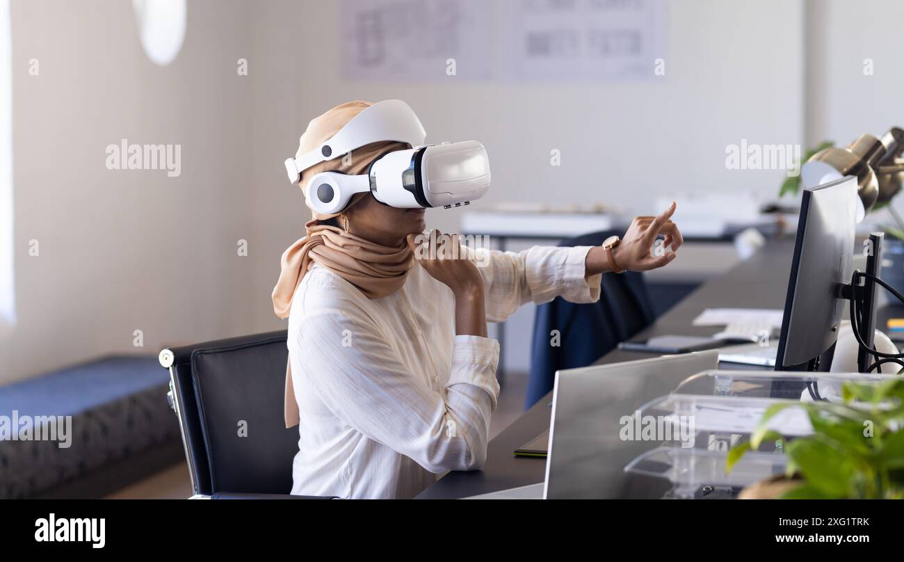 Woman interacting digital interface hi-res stock photography and images - Alamy