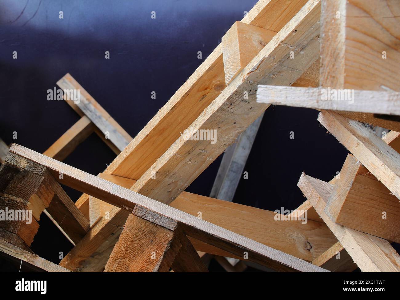 industrial waste container filled with wooden pallets ready for ...