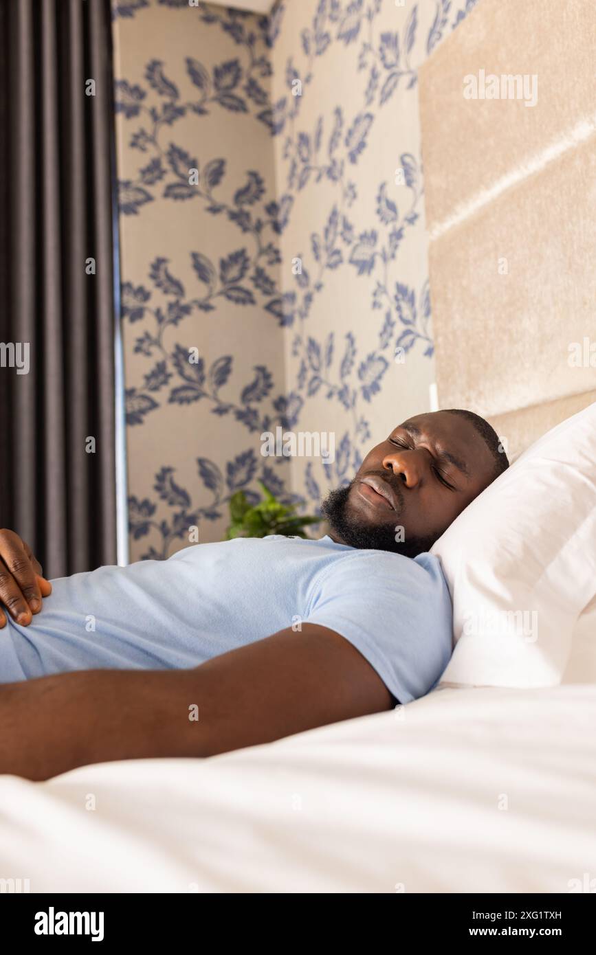 Man sleeping african american hi-res stock photography and images - Alamy