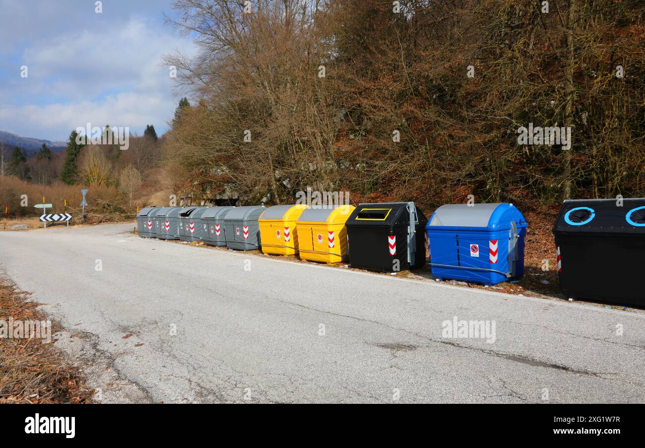 Row of recycling bins on the curbside in the country Stock Photo - Alamy
