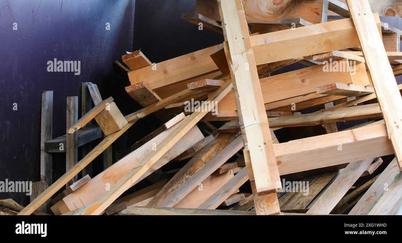 large waste container filled with wooden pallets ready for recycling at ...