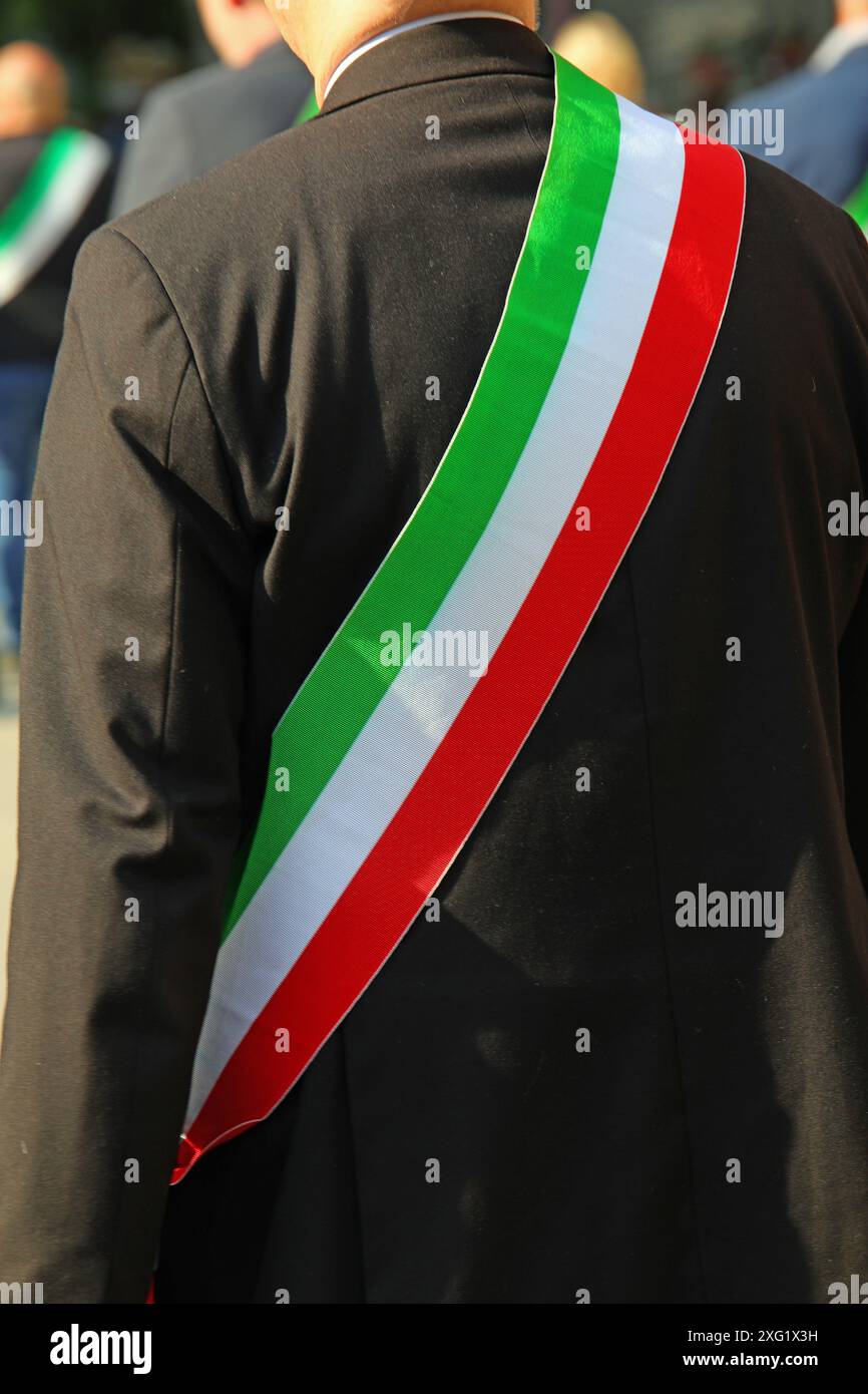 Elegant Italian mayor in a black jacket and the tricolor sash of the ...