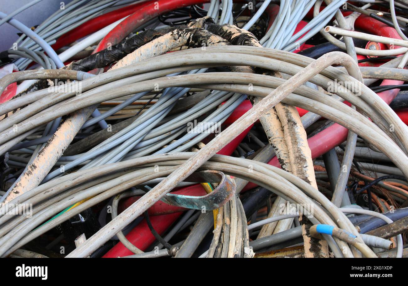 used old electrical cords in a recycling container for copper recycling ...
