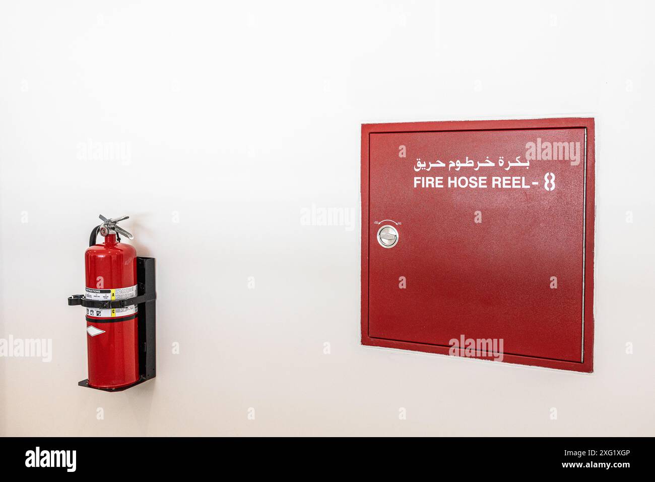The fire hose is packed in a red emergency box on the wall, Fire Hose ...