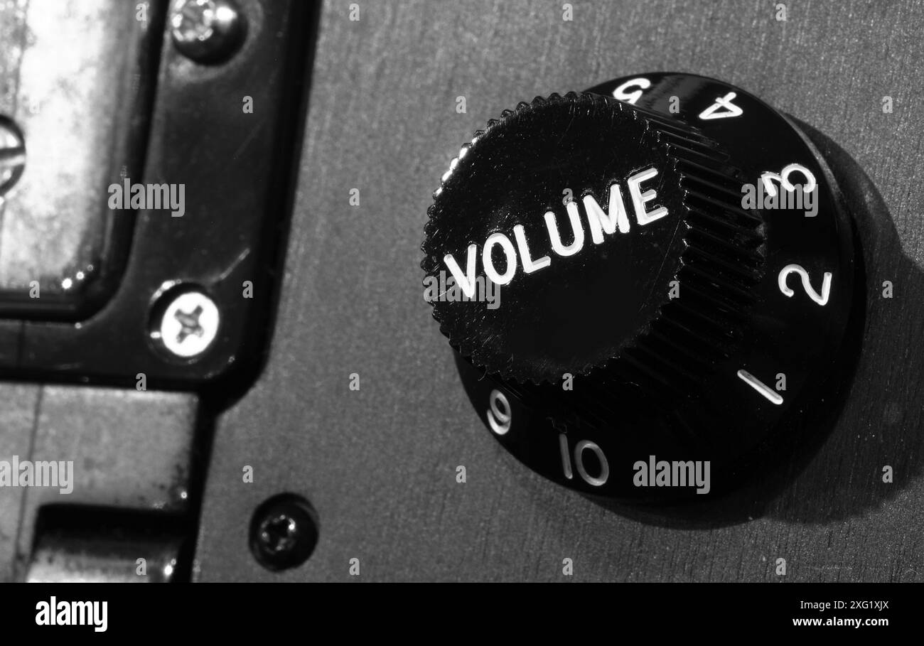 BIG volume knob with numbers of a vintage style electric guitar with ...