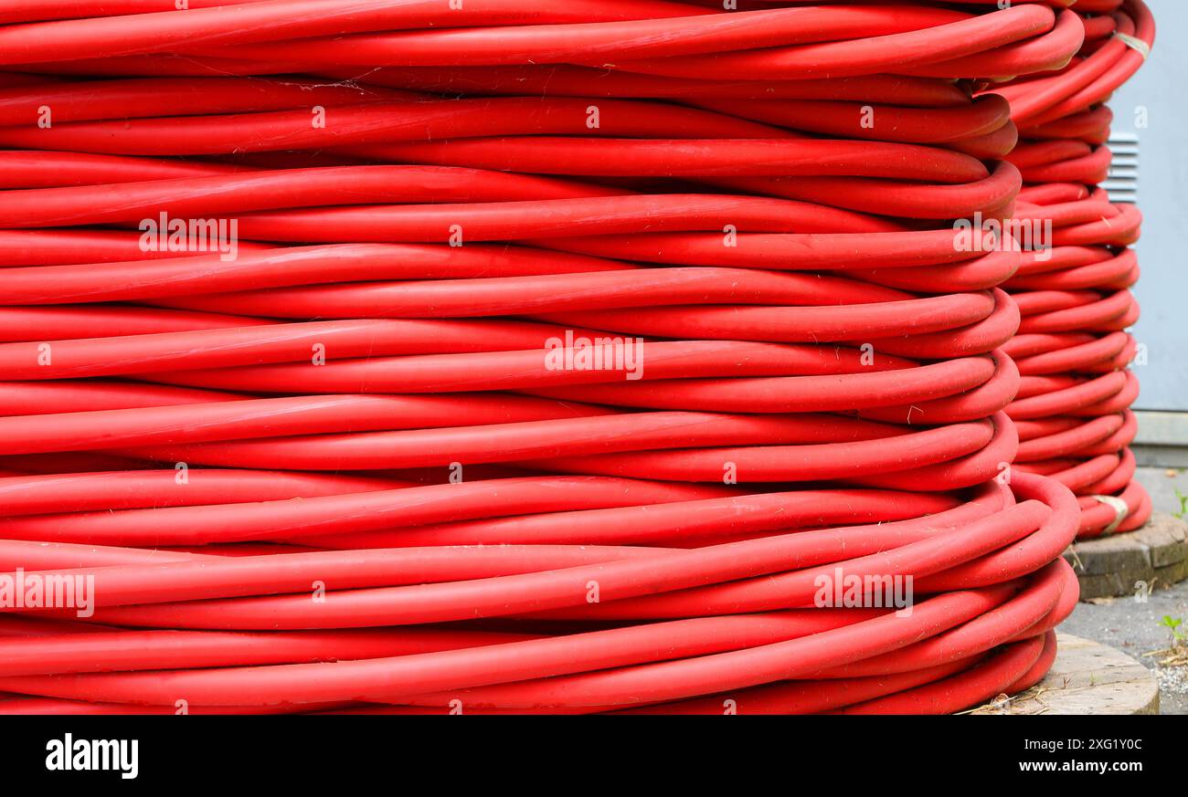 large spool of high-voltage insulated cable for transmitting ...