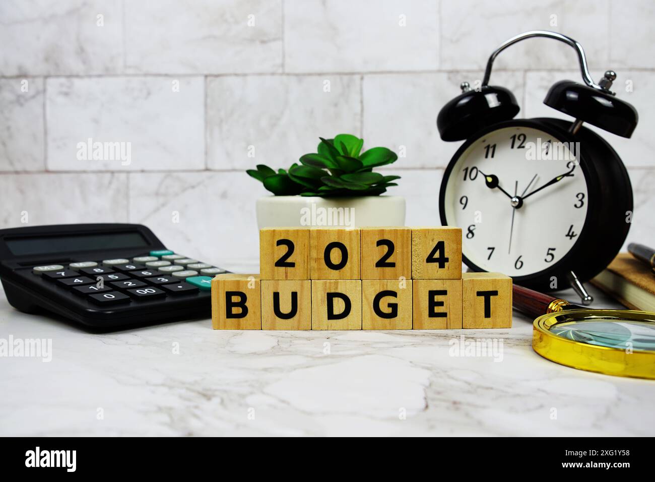 Budget 2024 with wooden blocks alphabet letters and stationery ...