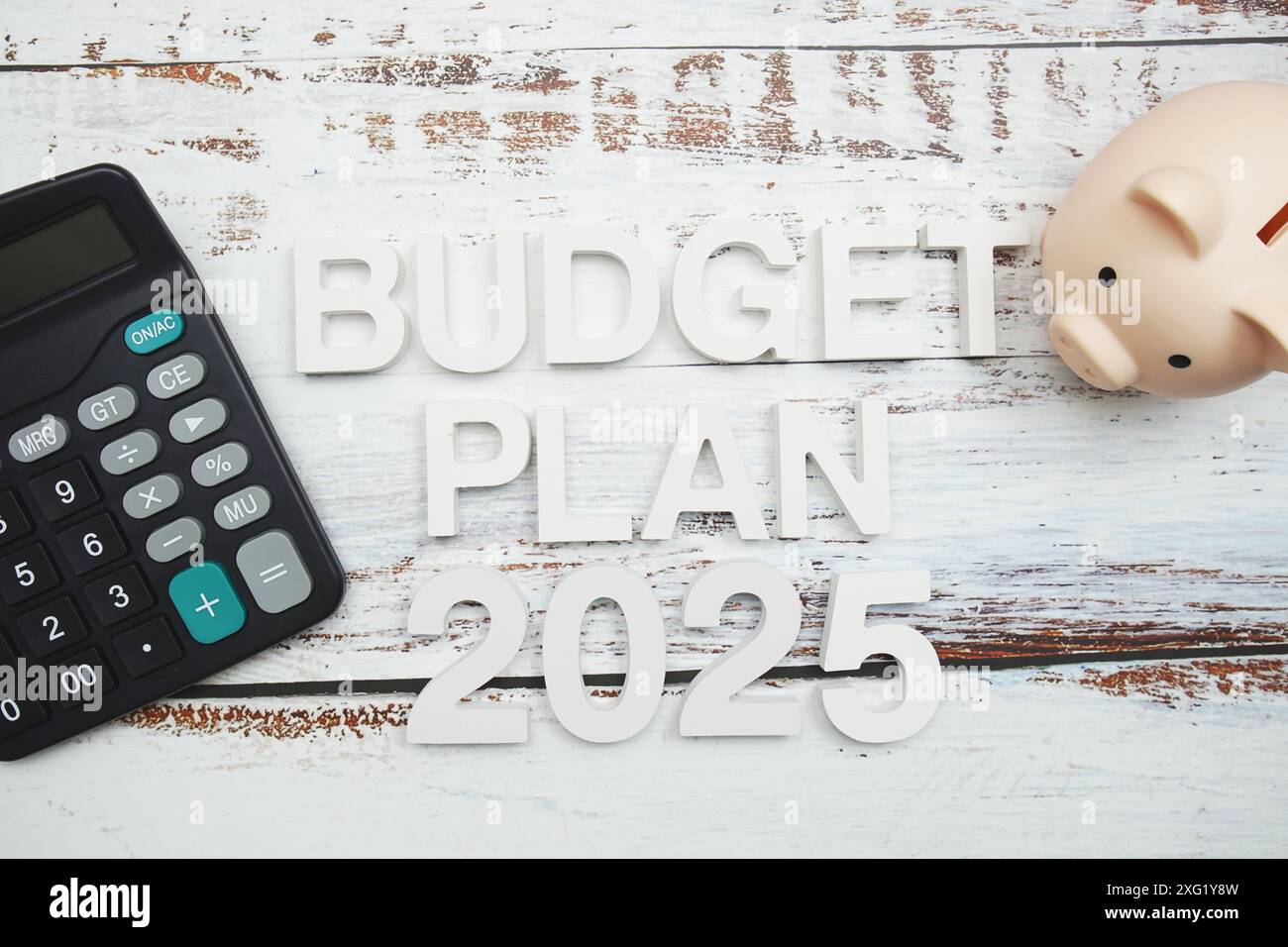 Budget Plan 2025 alphabet letter with calculator and piggy bank on ...
