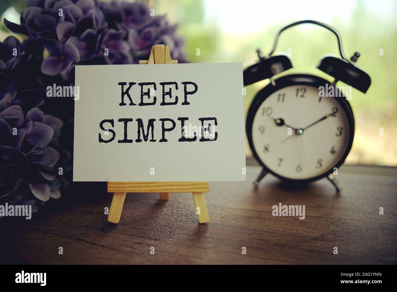 Keep simple text message text message on paper card with wooden easel ...