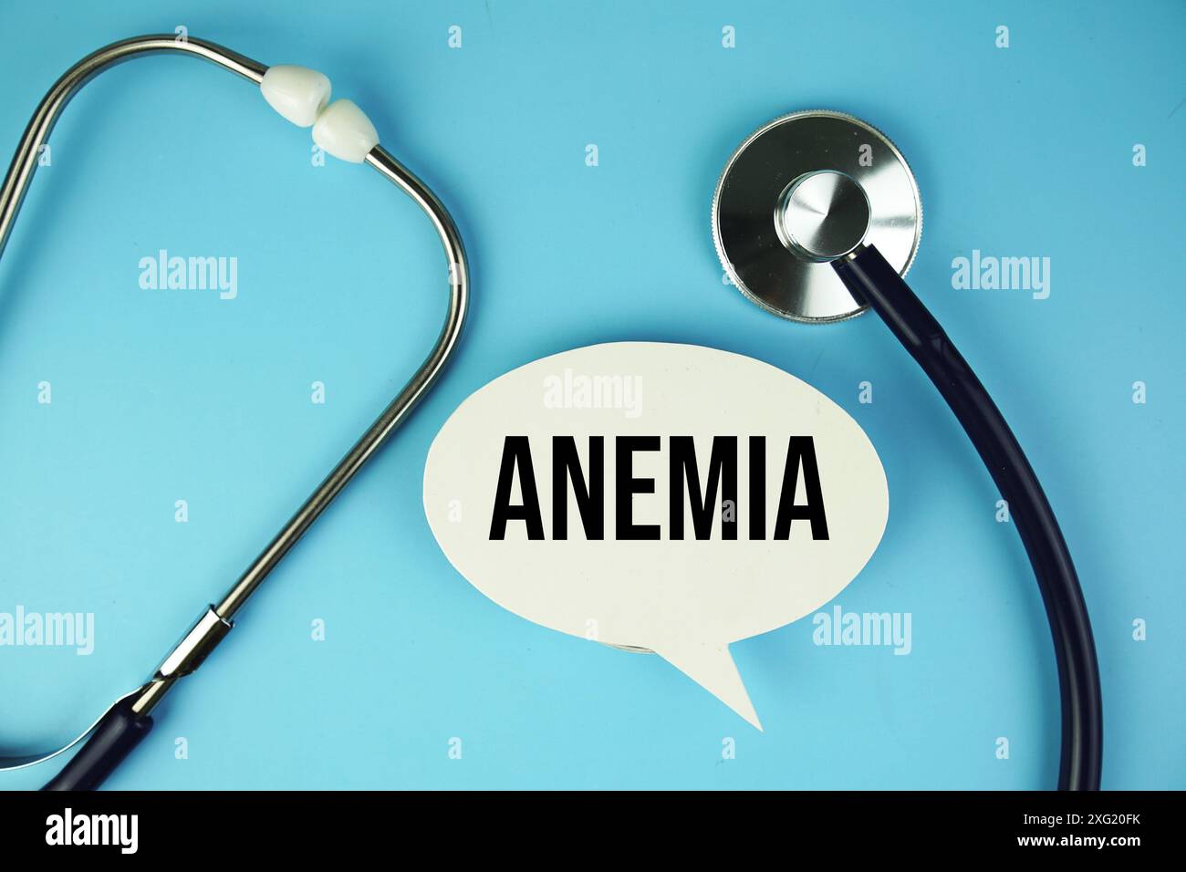 Anemia text on paper card with stethoscope top view on blue background ...