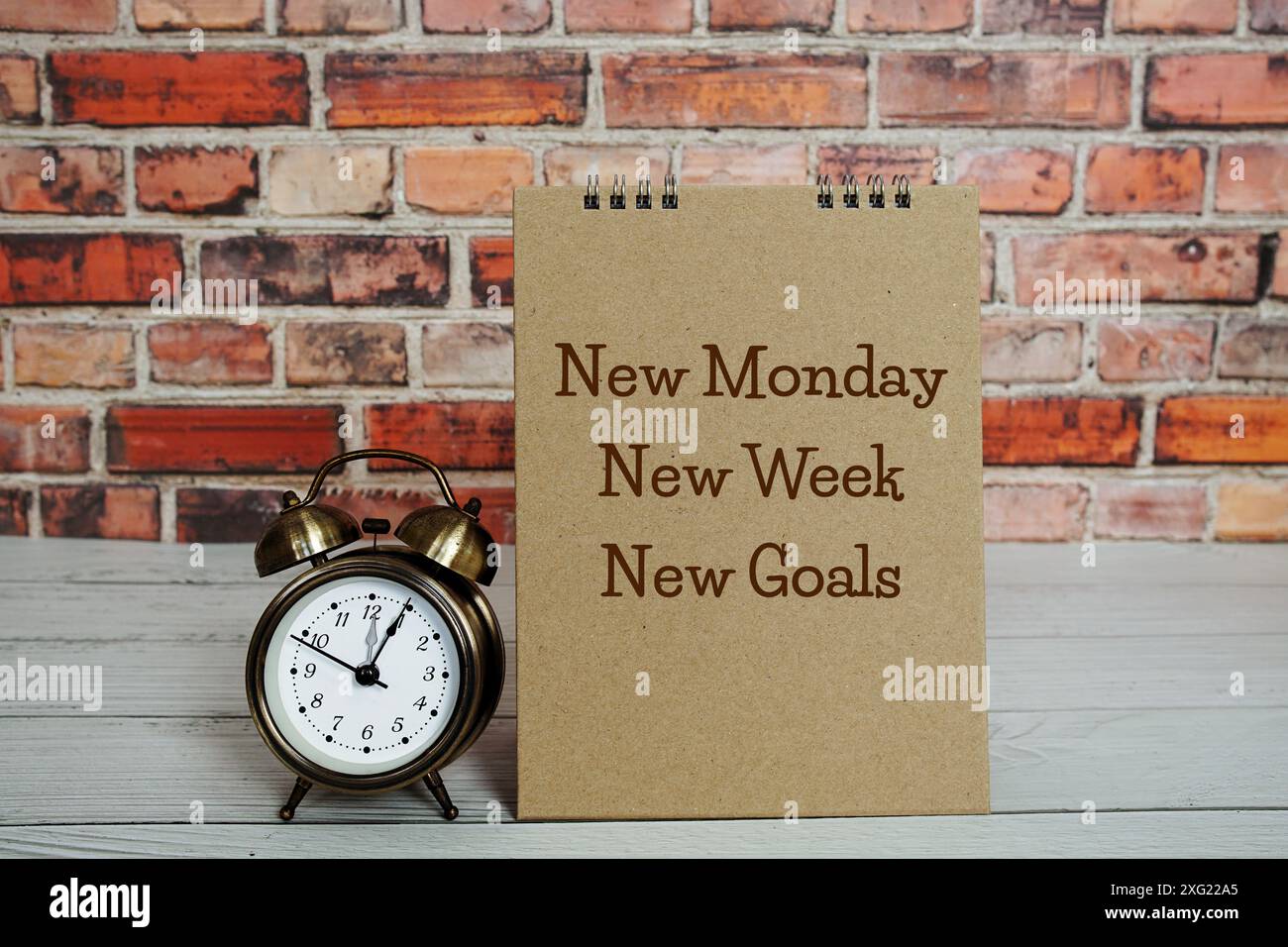 New Monday New Week New Goals text message with alarm clock on wooden background, Inspriation ...