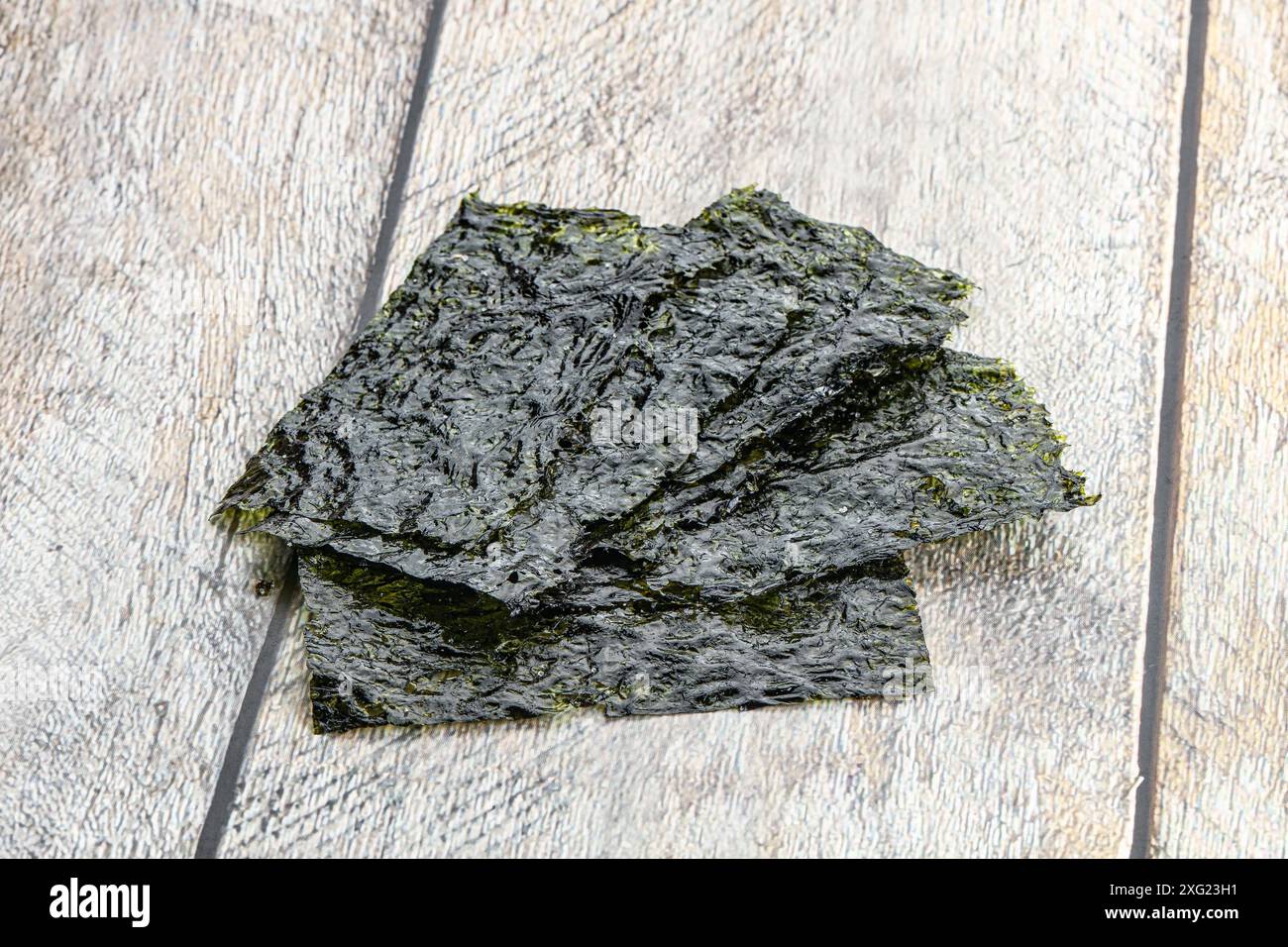 Korean nori seaweed chips heap snack Stock Photo - Alamy