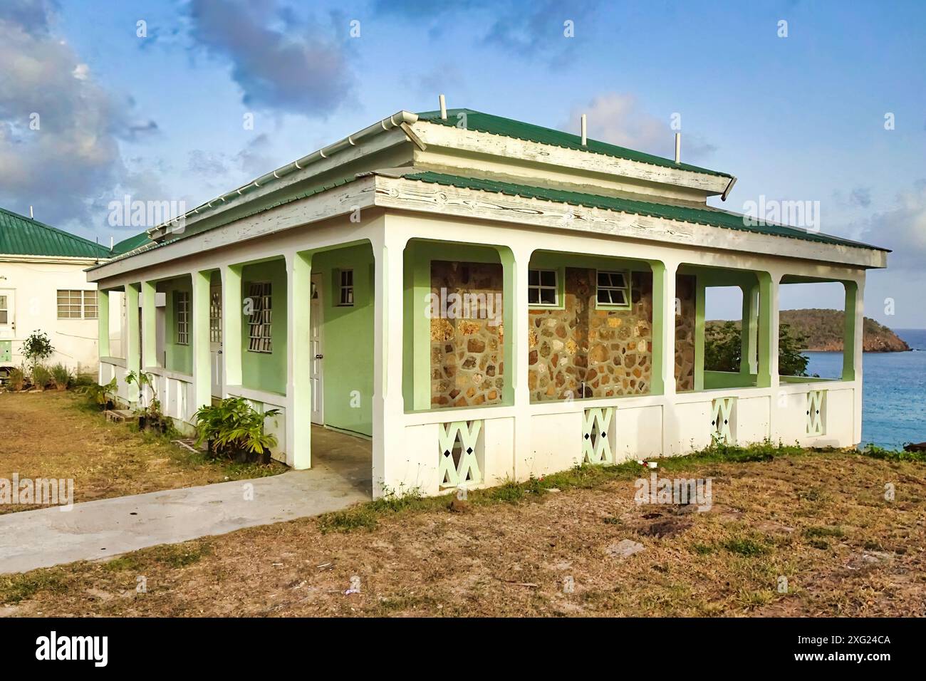 A colonial school house by the sea on Antigua, Caribbean Stock Photo ...