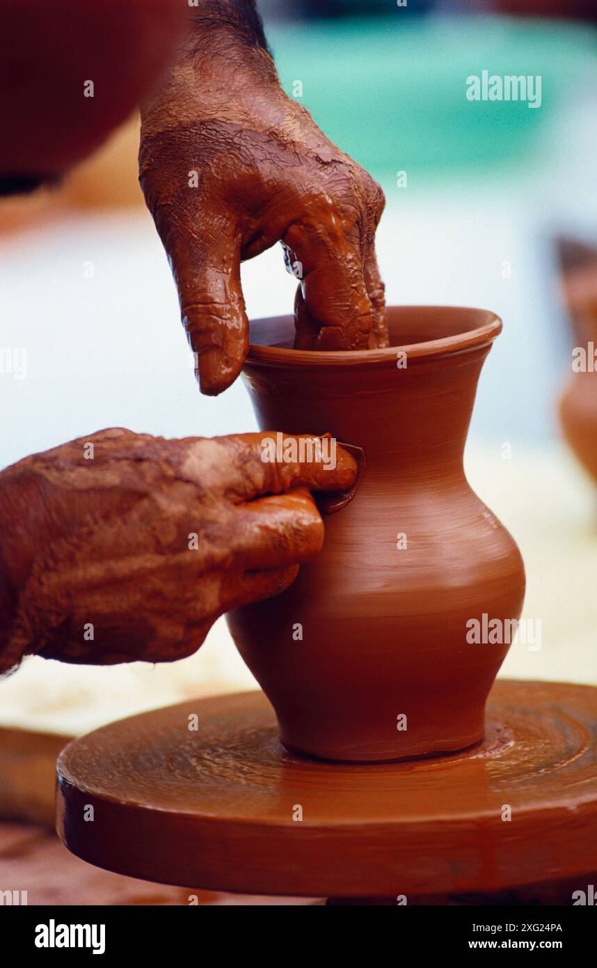 Vertical manufacturing handicraft pottery hi-res stock photography and ...