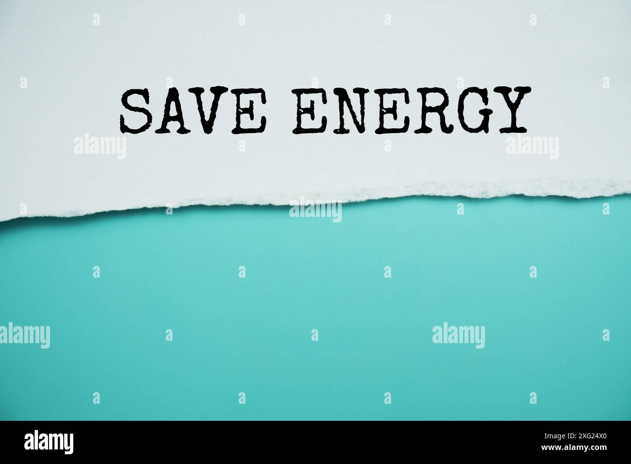 Save Energy message written on blue paper with torn paper background ...
