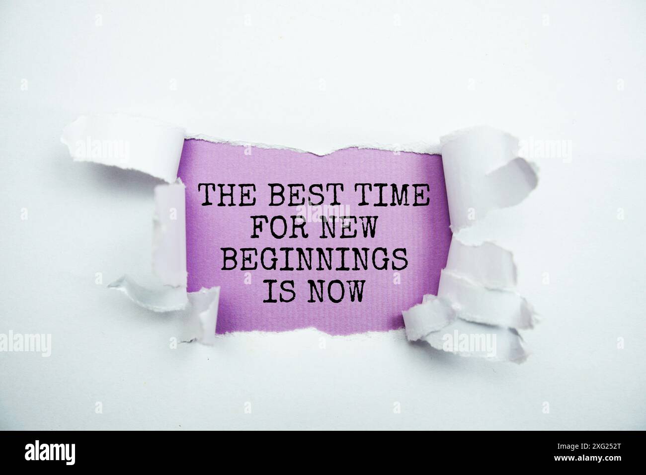 The Best Time For Nwe Beginnings Is Now message written on purple paper with torn paper ...