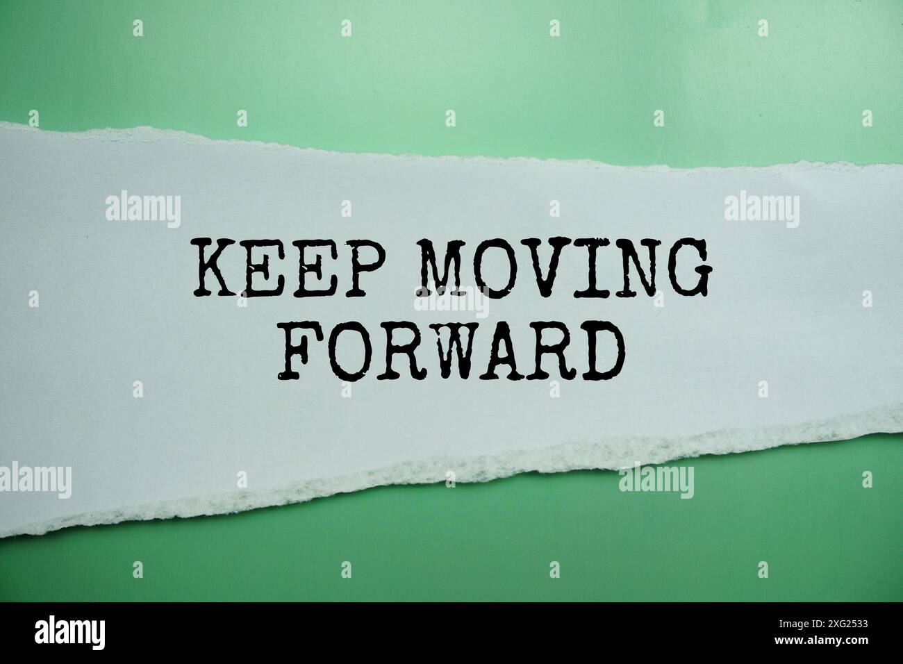 Keep Moving Forward message written on white paper with torn paper background Stock Photo - Alamy