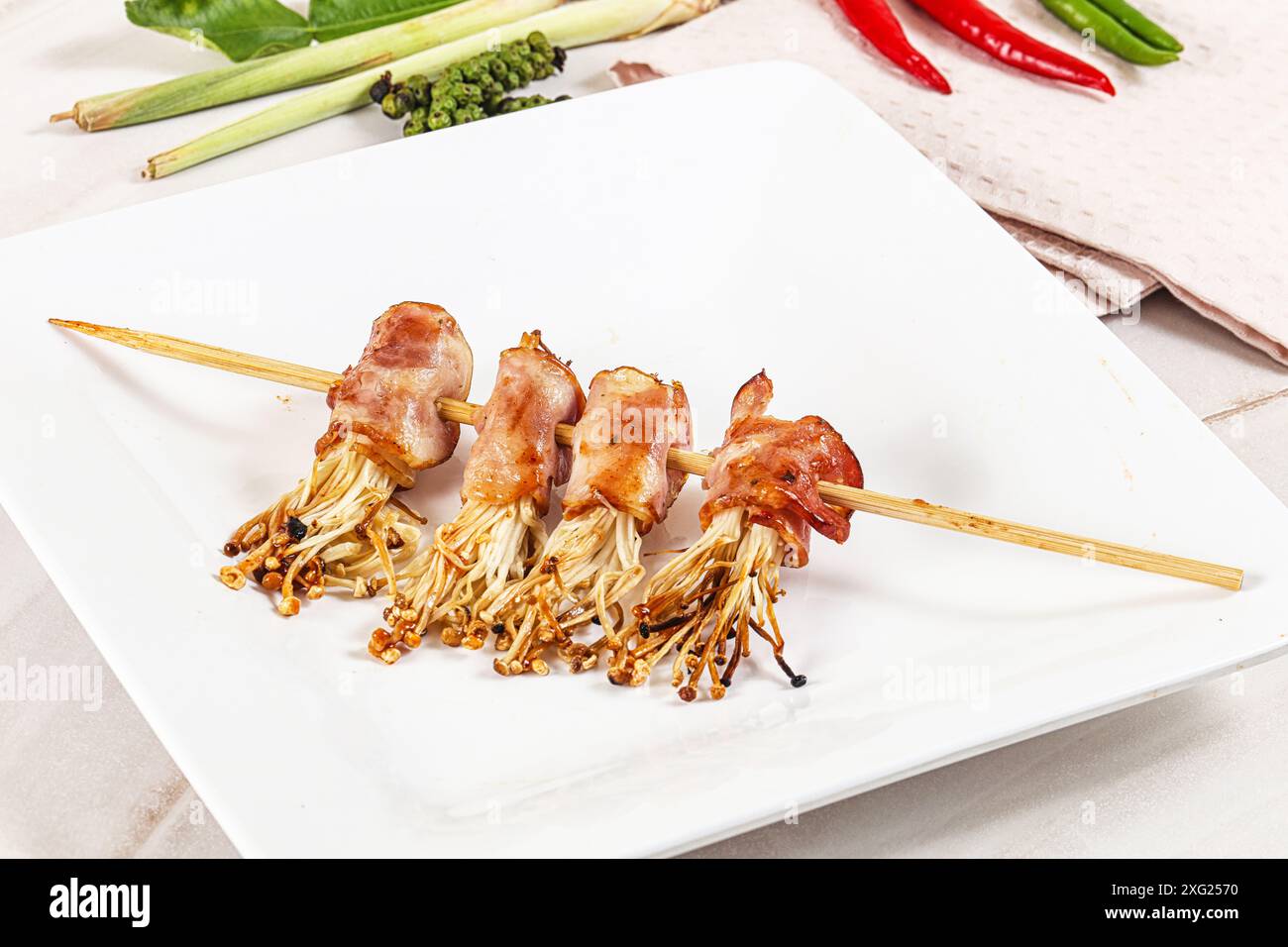 Thai Street foof satay with bacon and mushroom enoki skewer Stock Photo ...