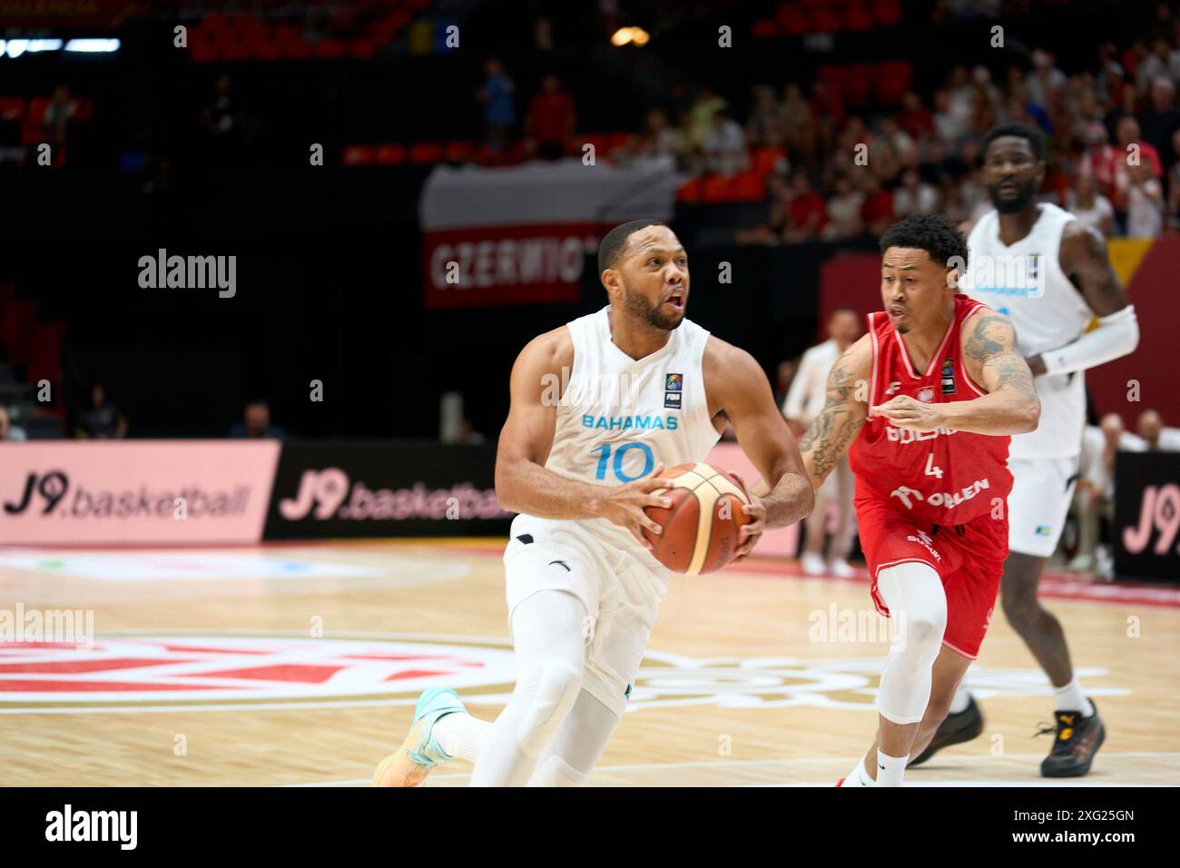 Eric Gordon from Bahamas team, AJ Slaughter from Poland team seen in ...