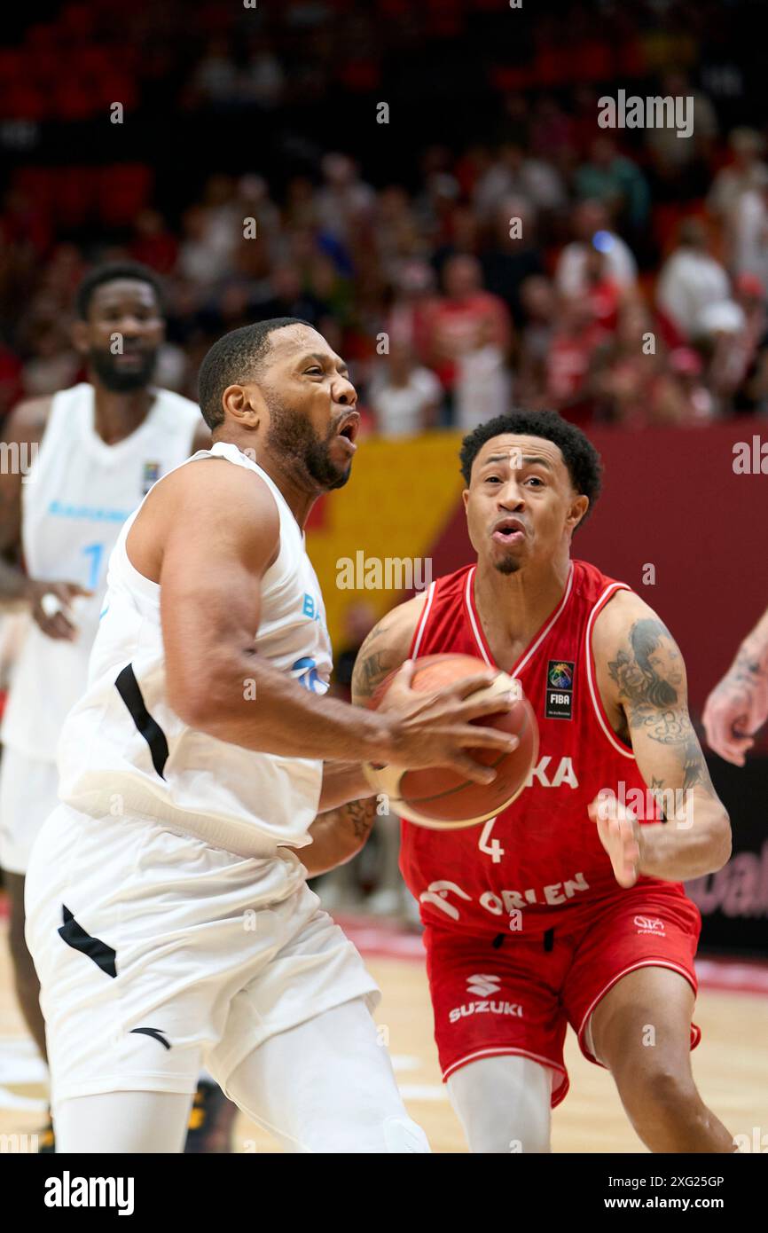 Eric Gordon from Bahamas team, AJ Slaughter from Poland team seen in ...