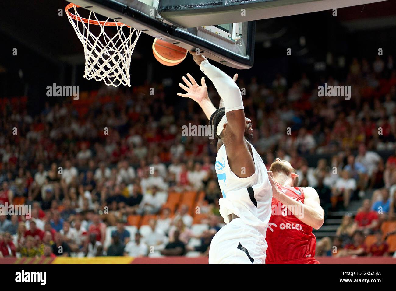 Michal Sokolowski from Poland team, Buddy Hield from Bahamas team seen ...