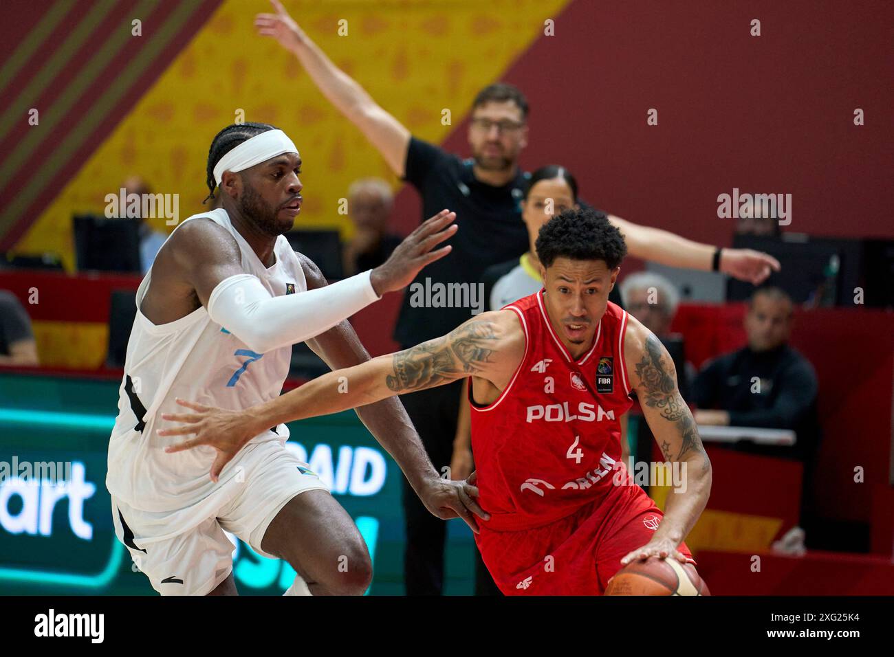 AJ Slaughter from Poland team, Buddy Hield from Bahamas team seen in ...