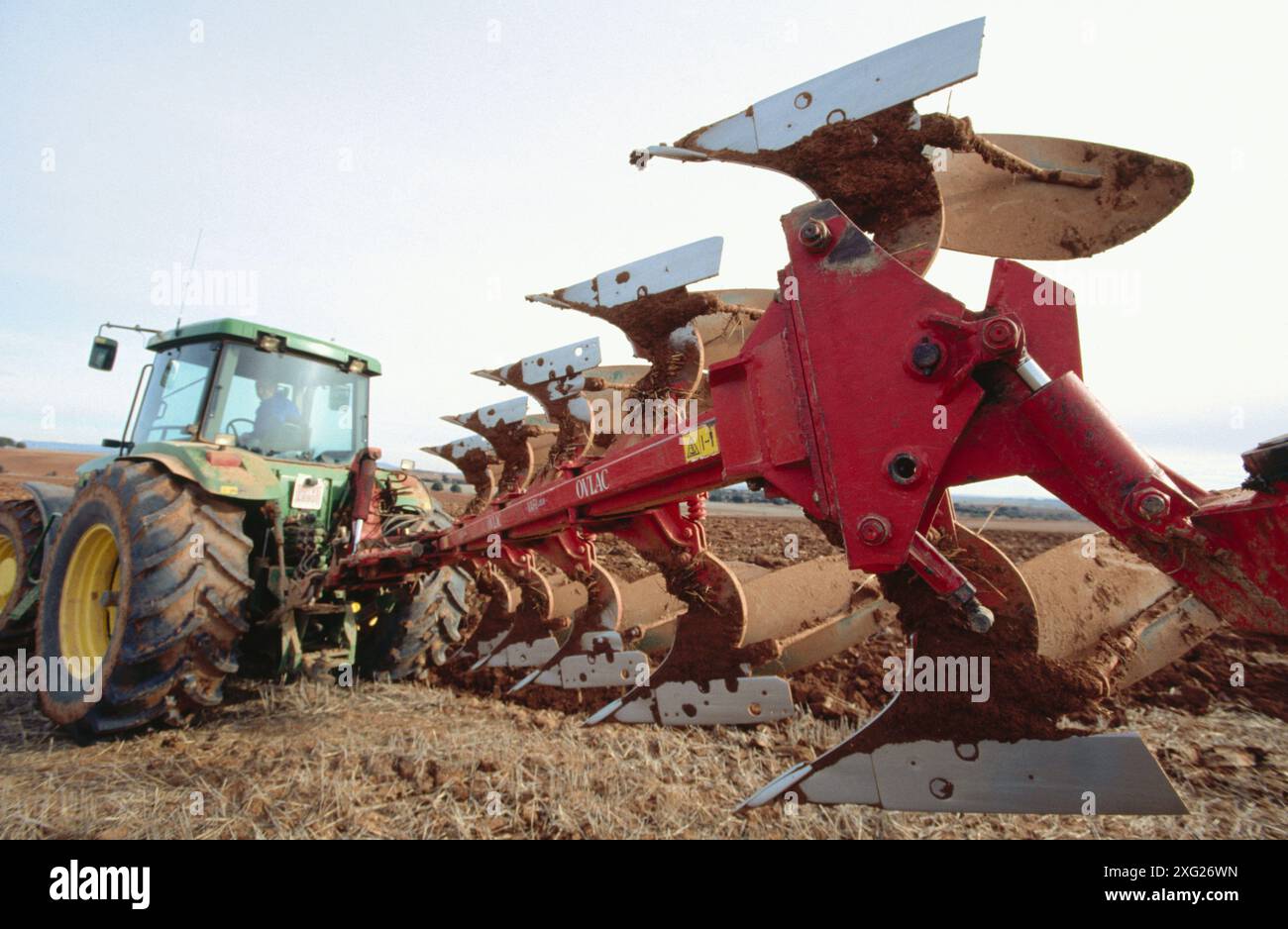 Tractor and farm implement. Spain Stock Photo - Alamy