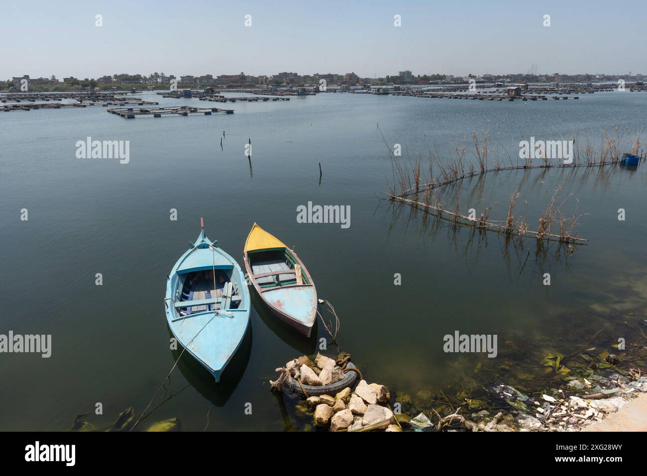 Rasheed, Egypt. 27th June, 2024. Small fishing boats and fish traps ...