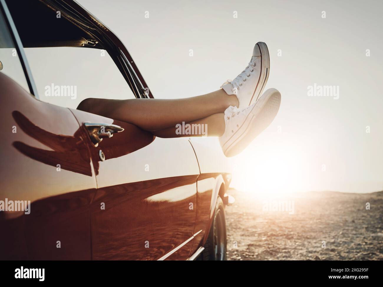 Travel, car and feet out car window with sunset for road trip, summer ...