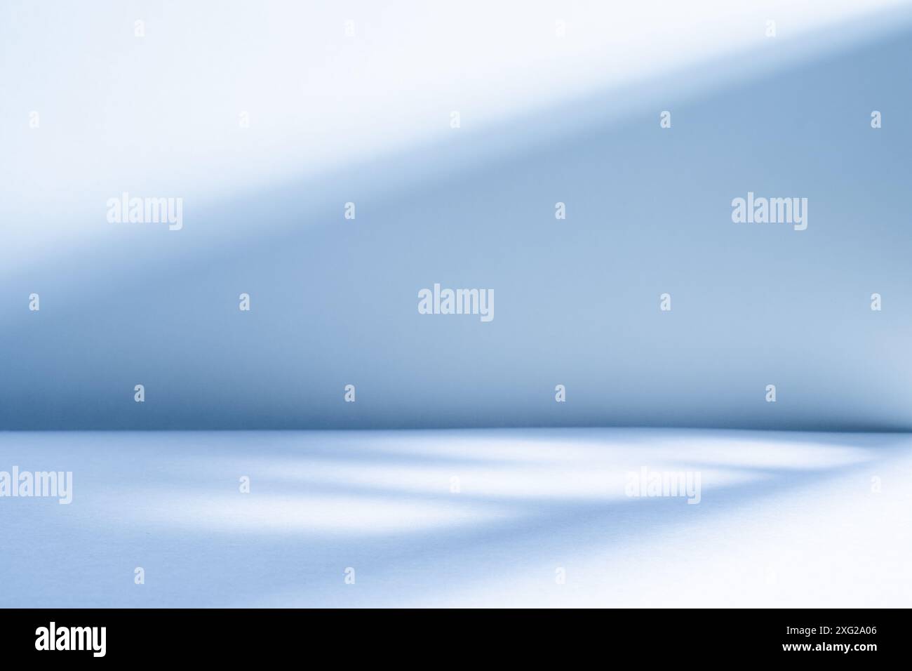 Light and Shadow on a White Surface in a Studio Setting Stock Photo - Alamy