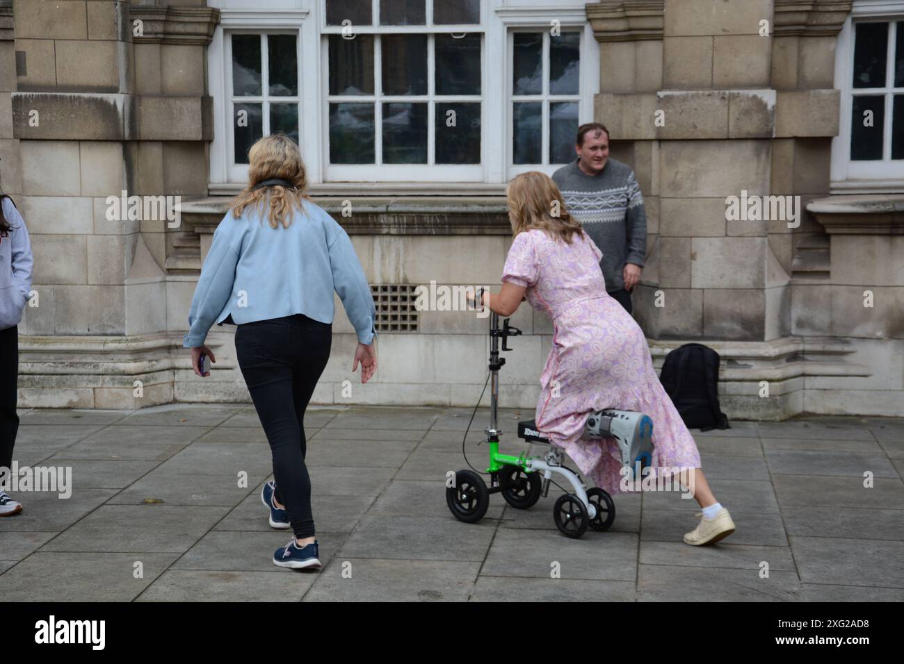 Sophie Rayworth who fractured her ankle, makes her way to Millbank ...