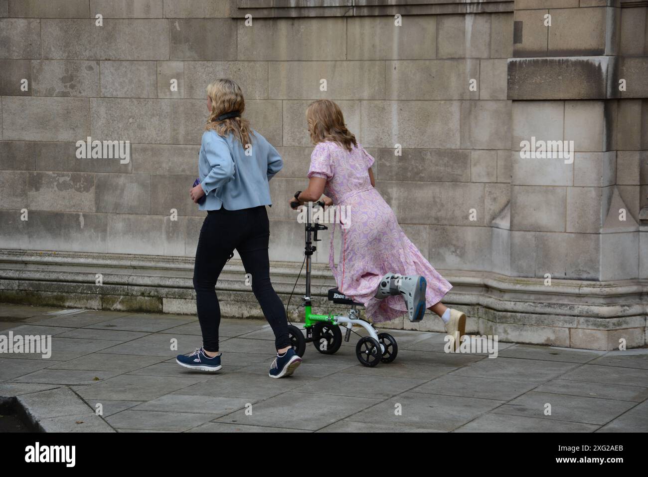 Sophie Rayworth who fractured her ankle, makes her way to Millbank ...