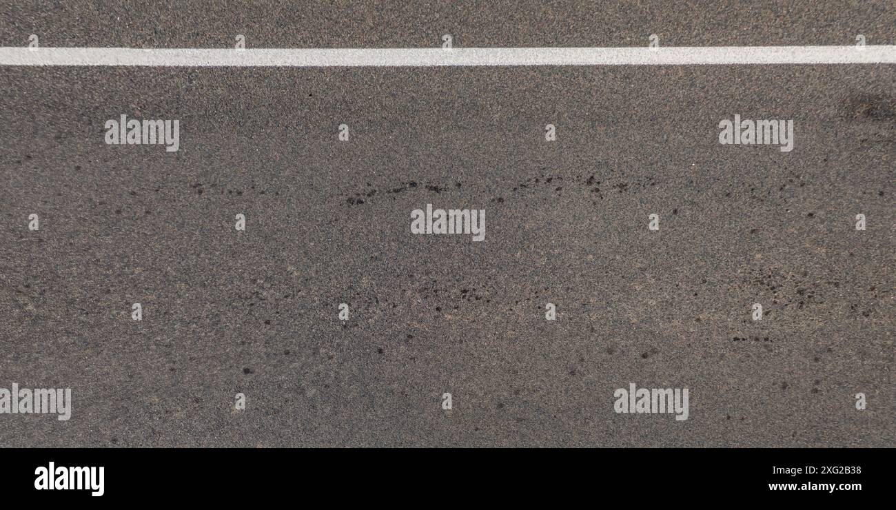 view from above on texture of asphalt road with cracks Stock Photo - Alamy