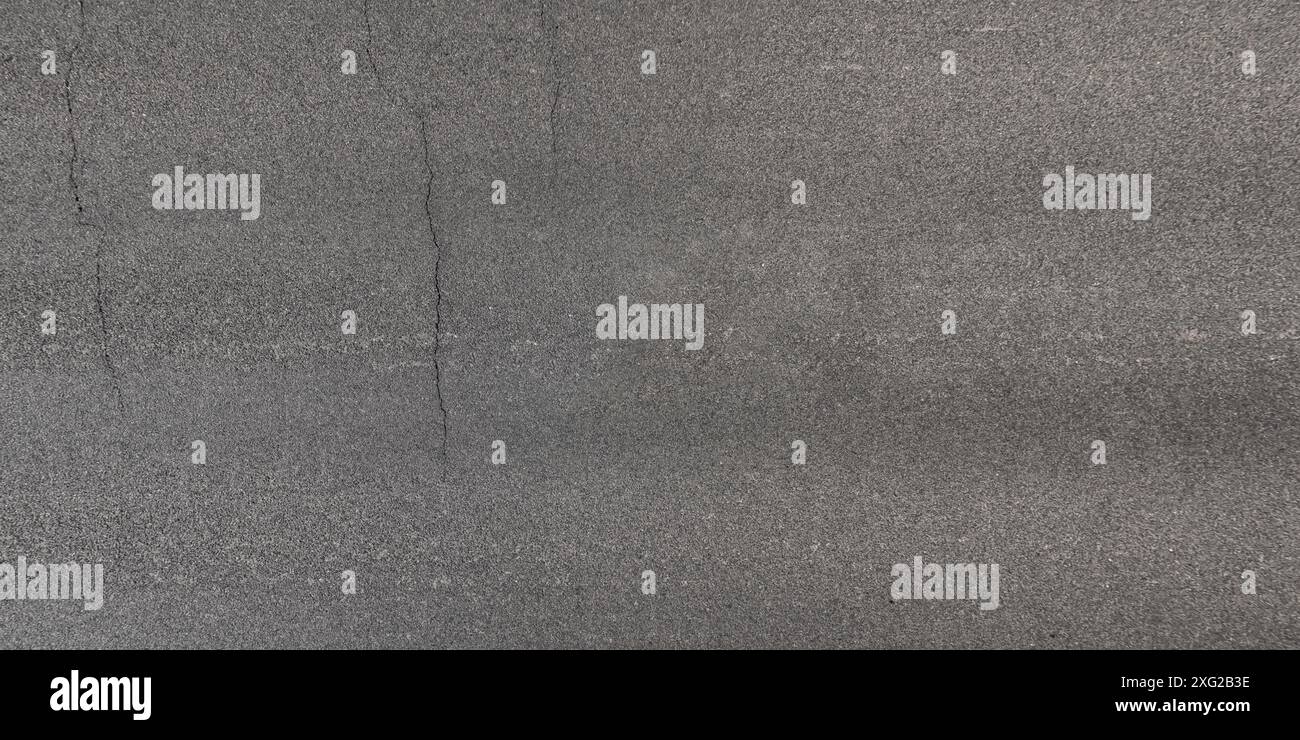 view from above on texture of asphalt road with cracks Stock Photo - Alamy